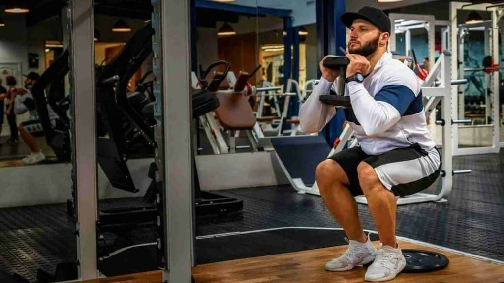 How To Do A Proper Heel-Elevated Goblet Squat To Build Your Quads